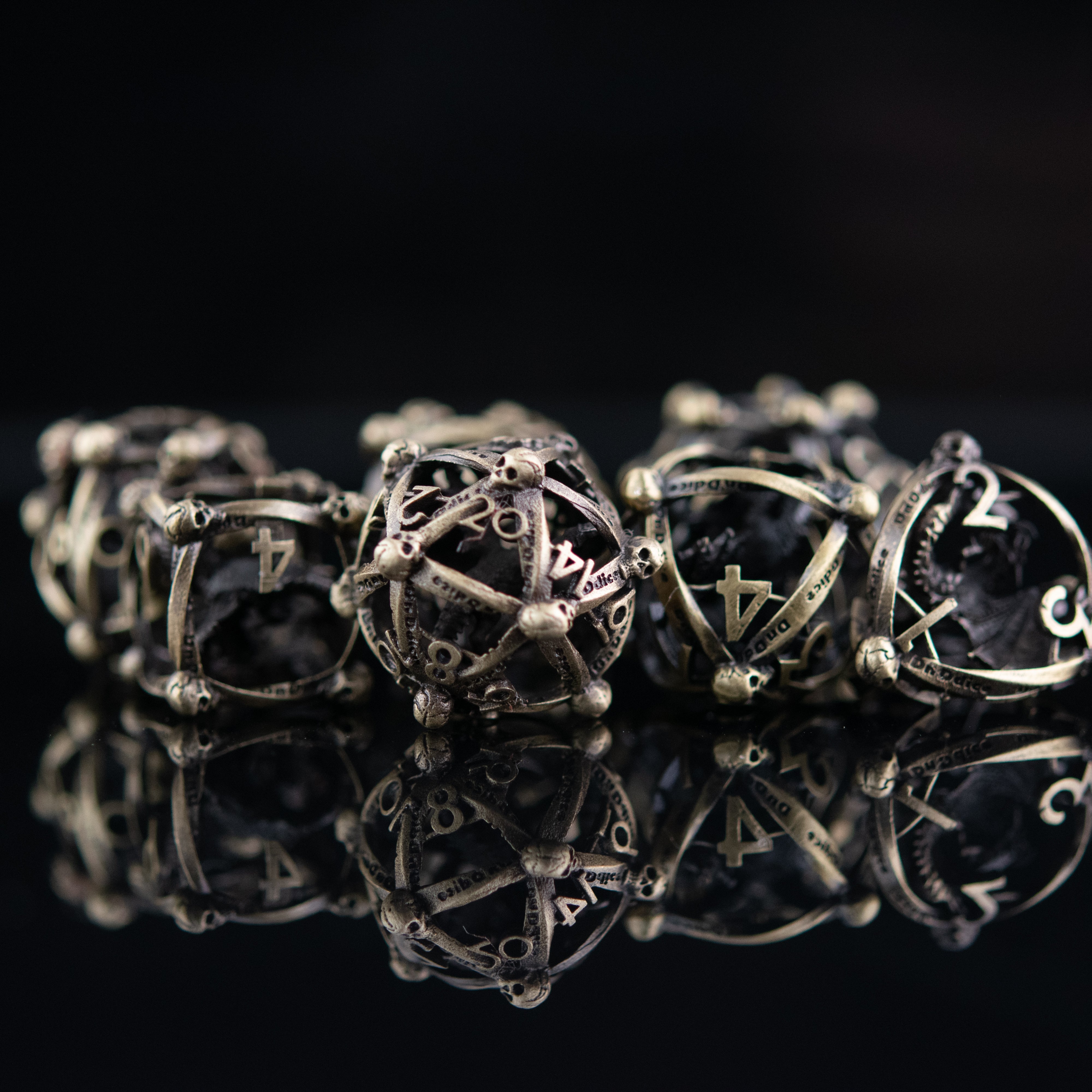 Draco Immortui Hollow Metal Dice Set - Champagne Gold – TopDeck.gg Shop